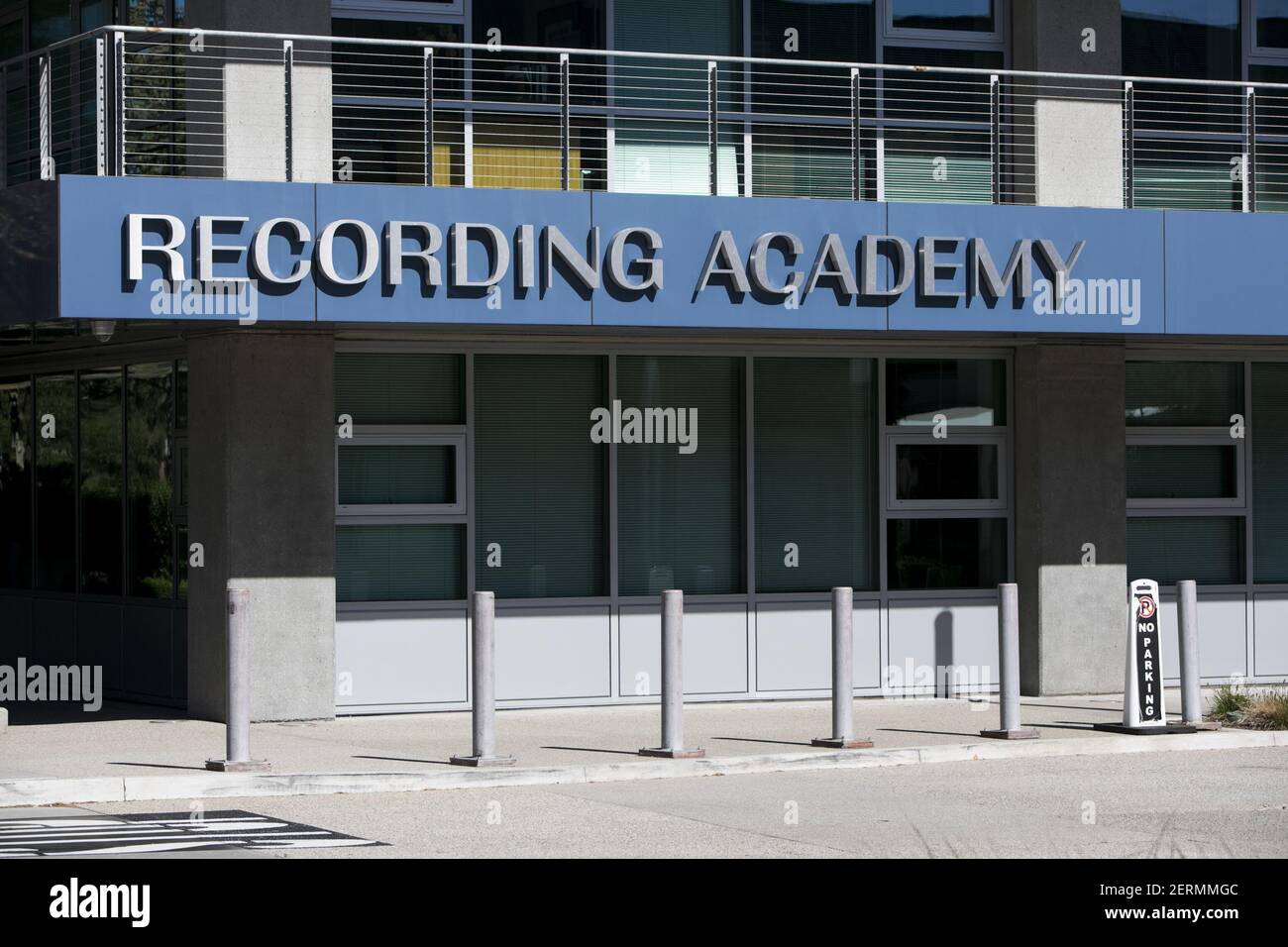 A logo sign outside of the headquarters of The Recording Academy in ...