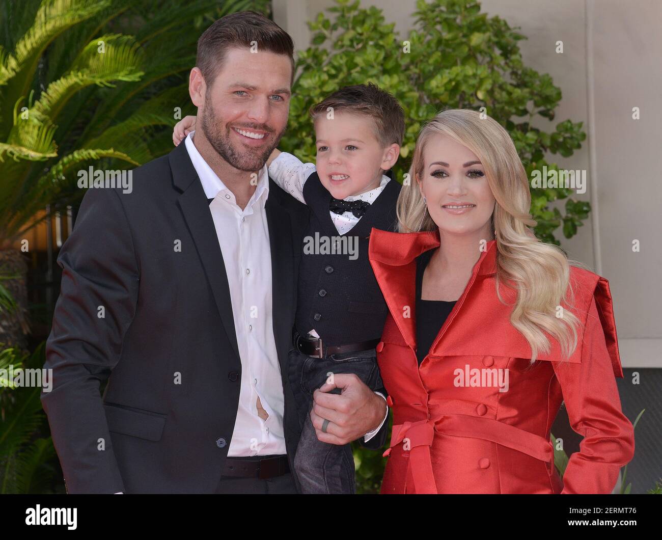 (L-R) Mike Fisher, Isaiah Michael Fisher and Carrie Underwood at the ...