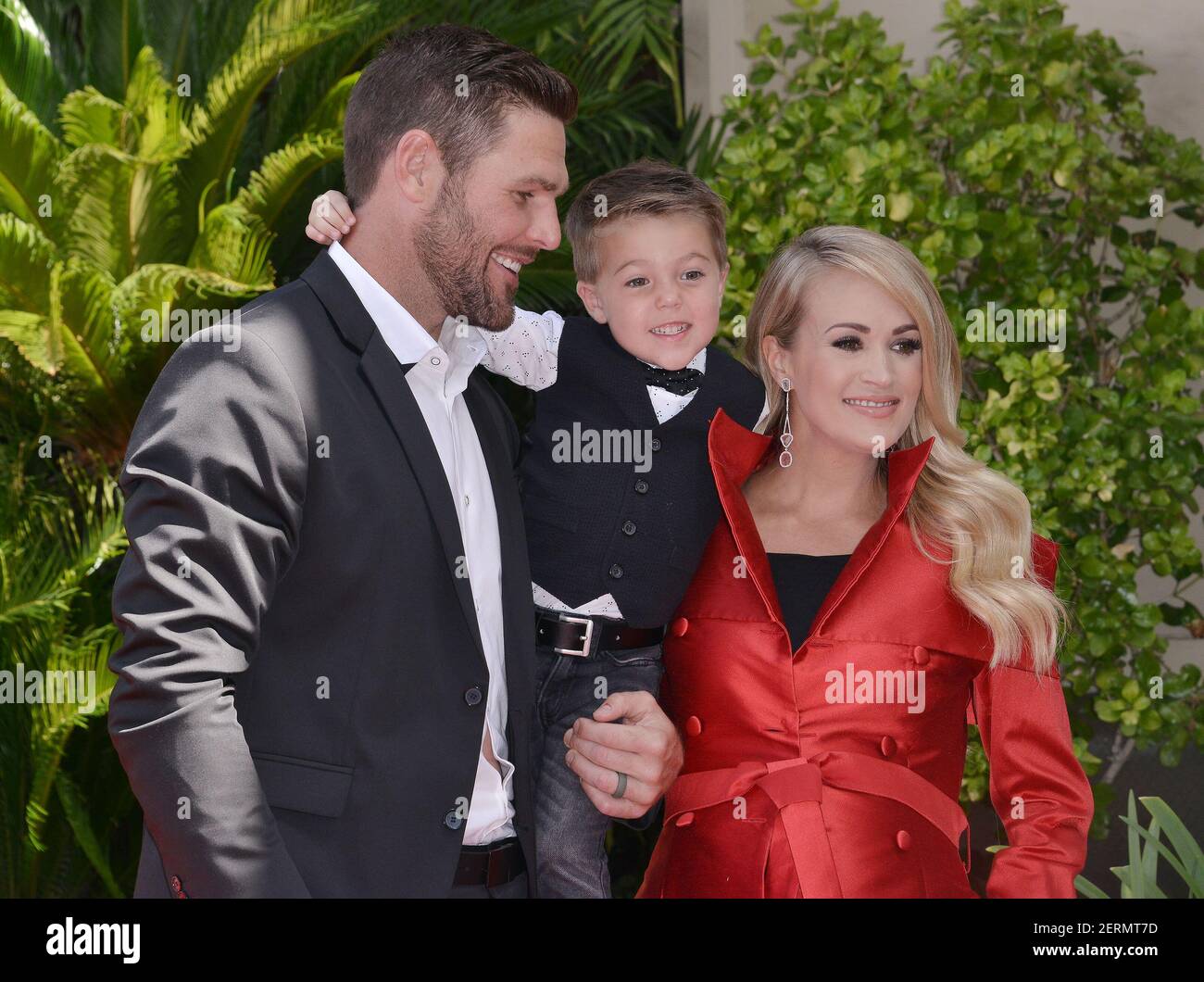 (L-R) Mike Fisher, Isaiah Michael Fisher and Carrie Underwood at the ...
