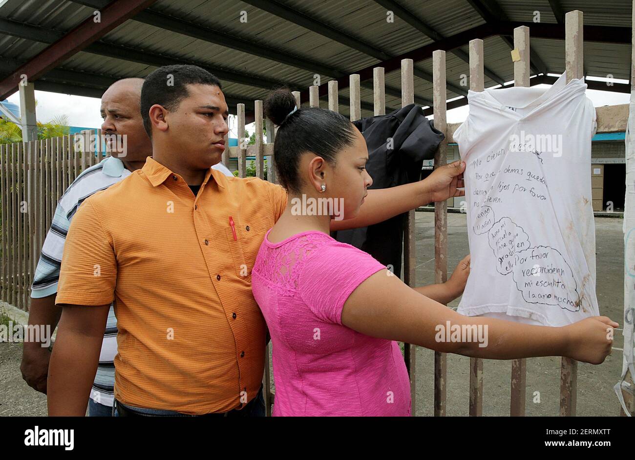 Student Genesis Velazquez with her father Felipe Velazquez, far left ...