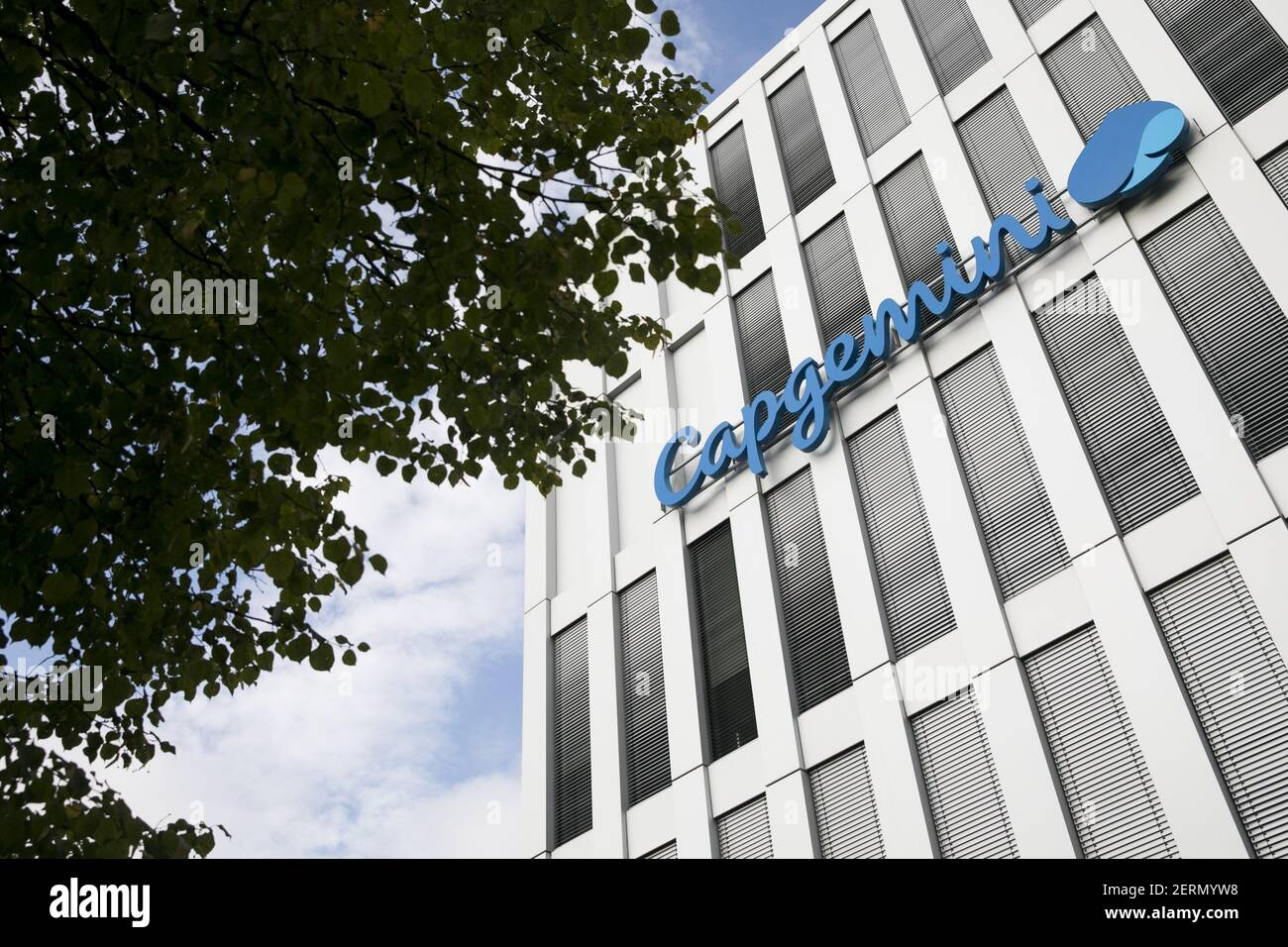 A logo sign outside of a facility occupied by Capgemini in Munich ...