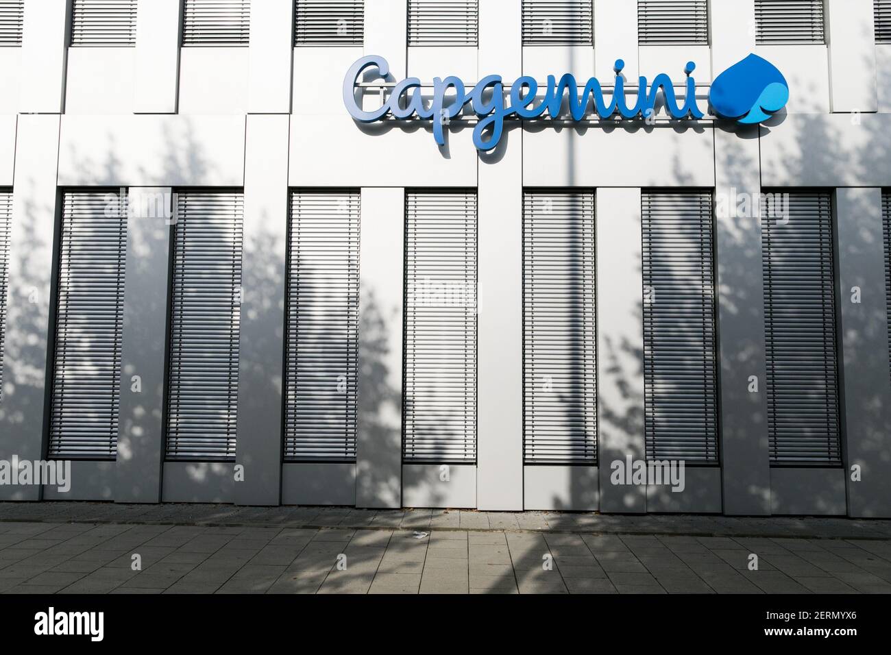 A logo sign outside of a facility occupied by Capgemini in Munich ...