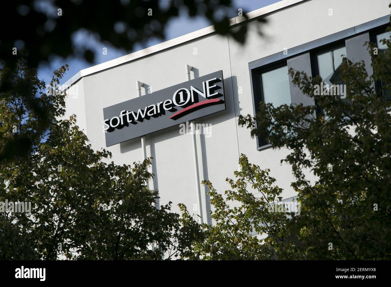 A logo sign outside of a facility occupied by SoftwareONE in Munich ...