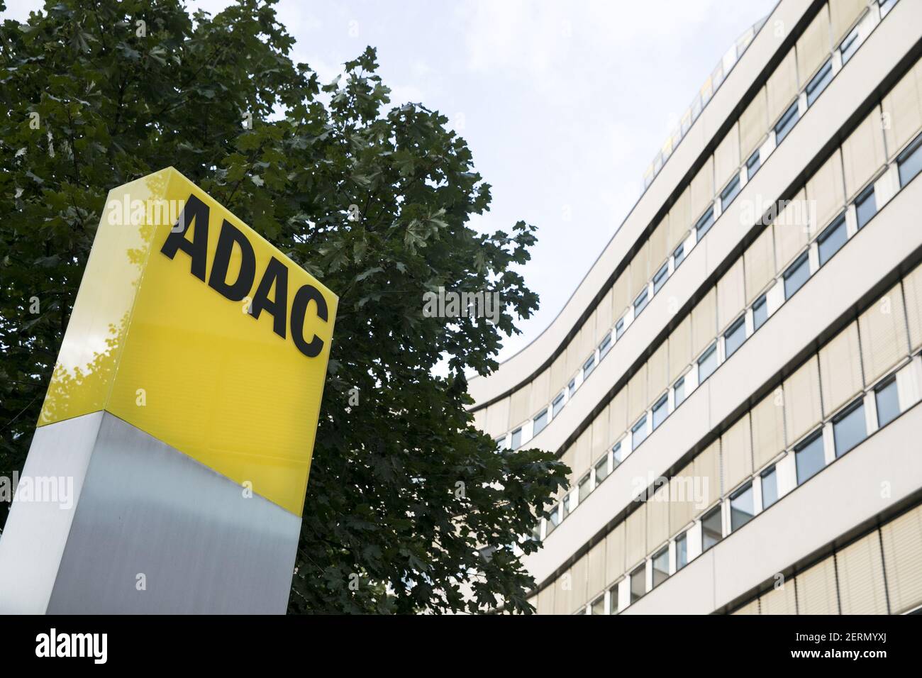 A logo sign outside of the headquarters of The ADAC (Allgemeiner ...