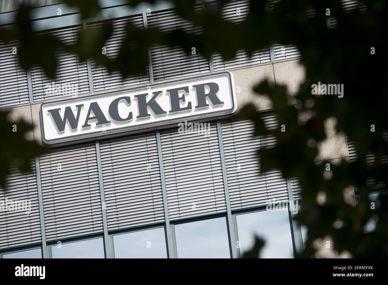 A logo sign outside of the headquarters of Wacker Chemie in Munich ...