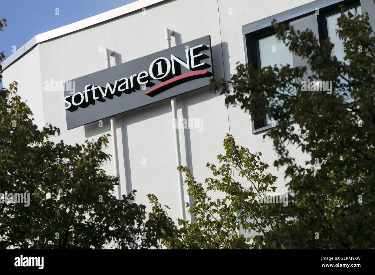 A logo sign outside of a facility occupied by SoftwareONE in Munich ...