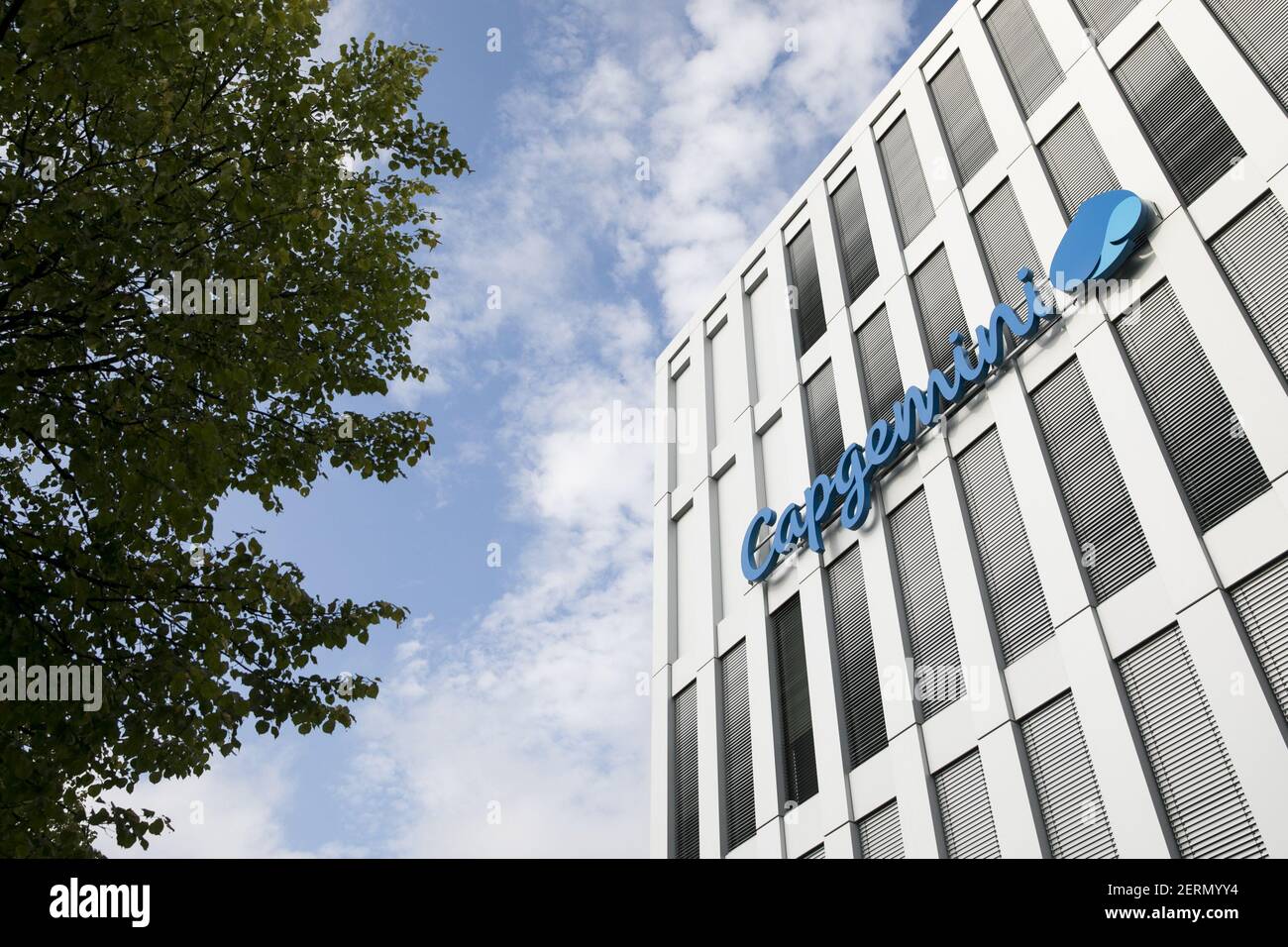 A logo sign outside of a facility occupied by Capgemini in Munich ...