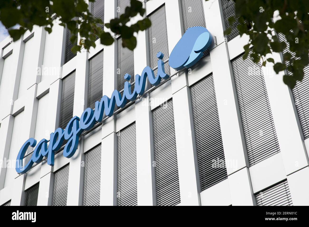 A logo sign outside of a facility occupied by Capgemini in Munich ...