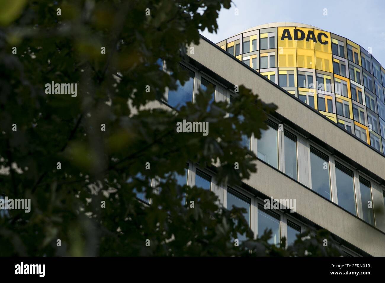 A logo sign outside of the headquarters of The ADAC (Allgemeiner ...