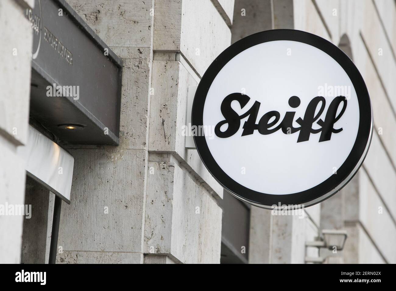 A logo sign outside of a Steiff retail toy store in Munich, Germany on ...