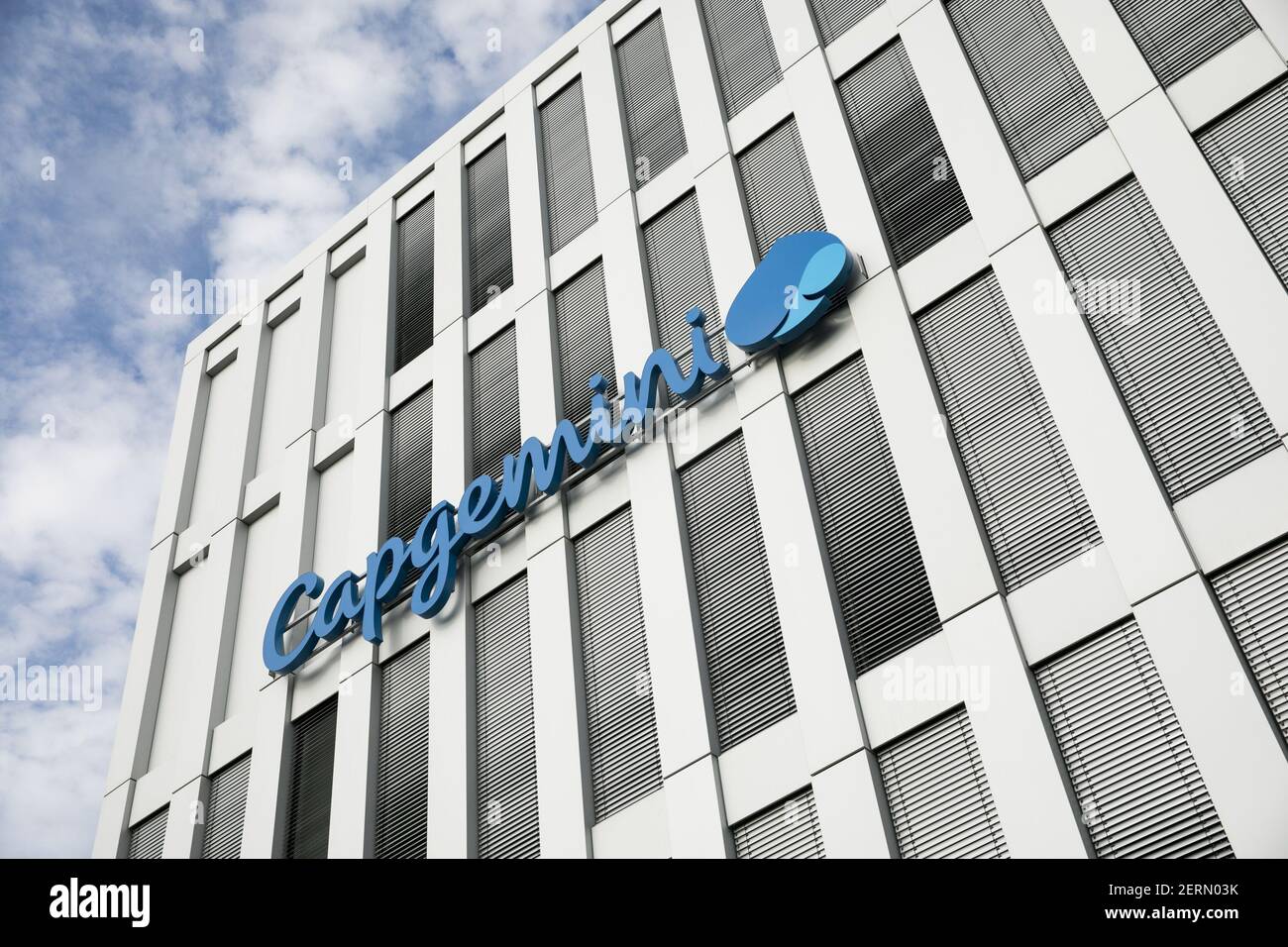 A logo sign outside of a facility occupied by Capgemini in Munich ...