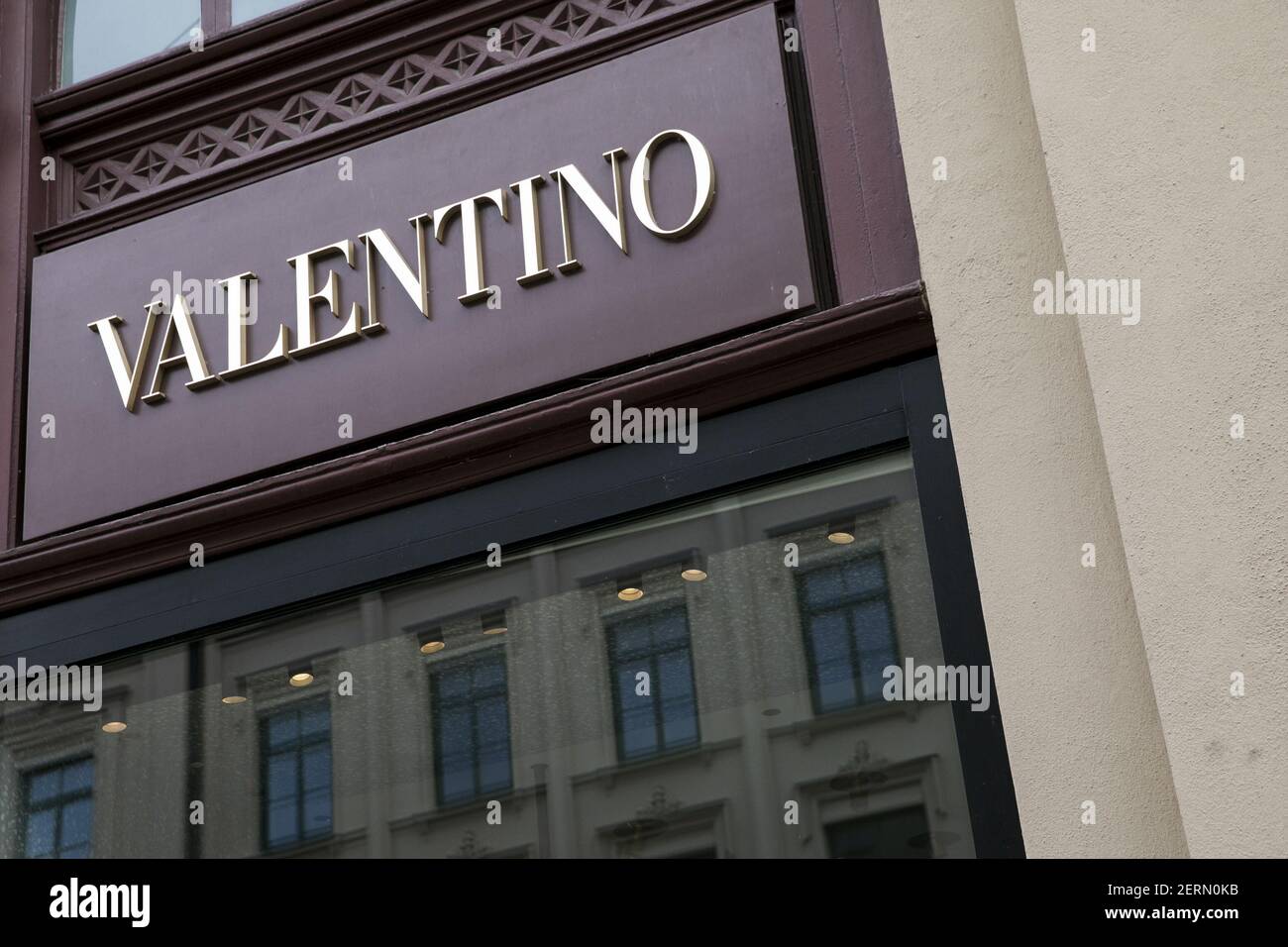 A logo sign outside of a Valentino retail store in Munich, Germany, on ...