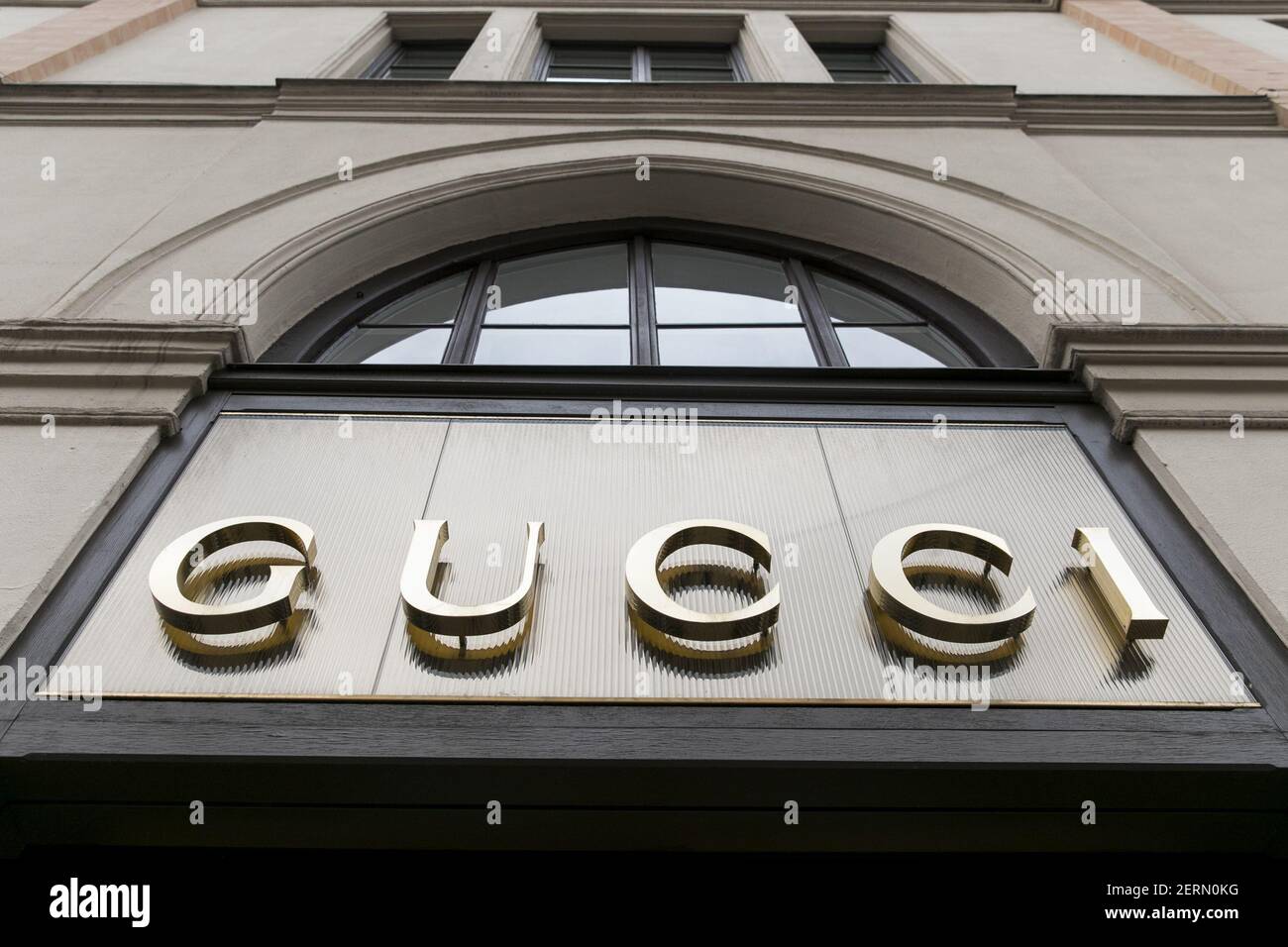 A logo sign outside of a Gucci retail store in Munich, Germany, on ...