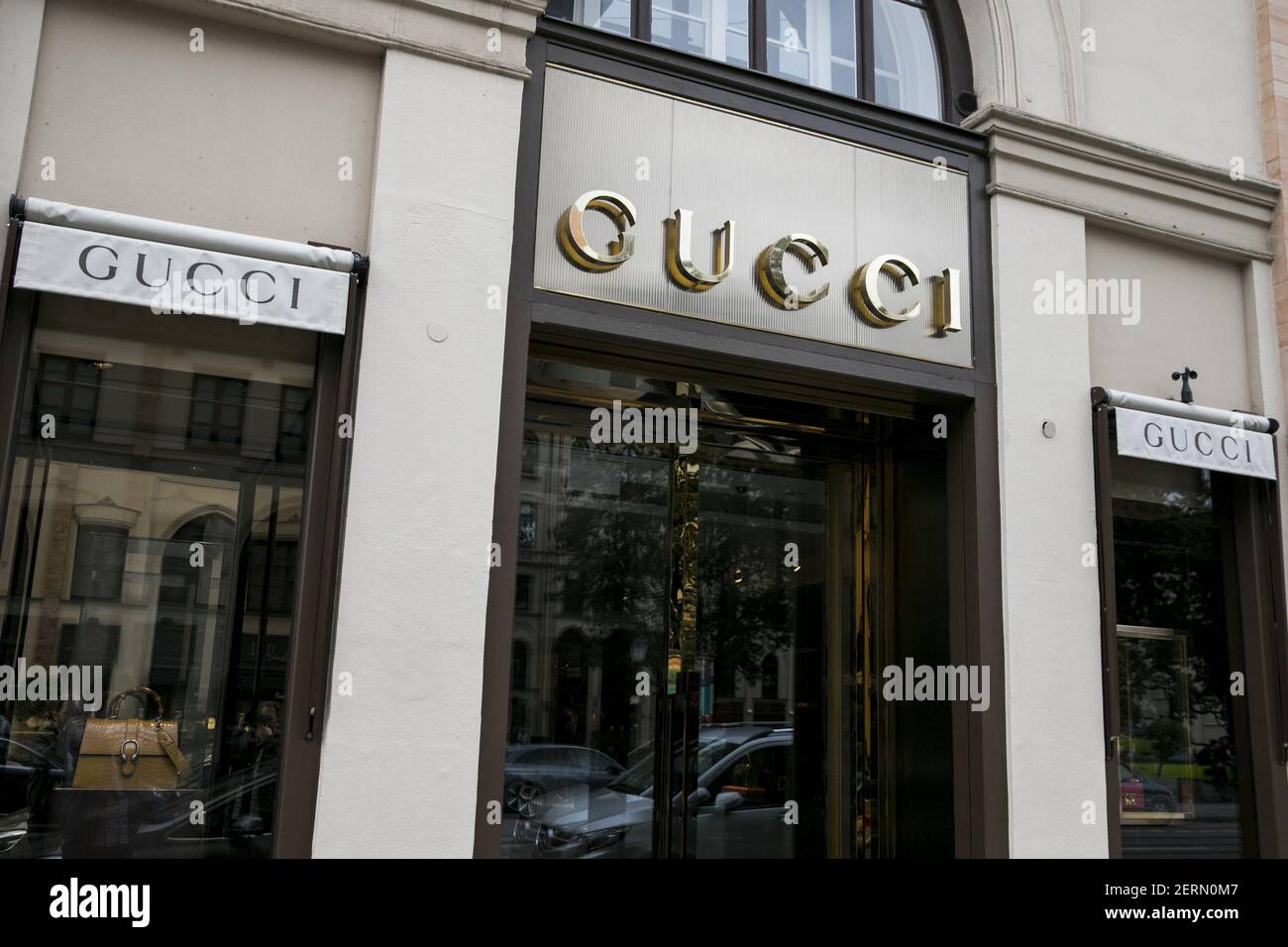 A logo sign outside of a Gucci retail store in Munich, Germany, on ...