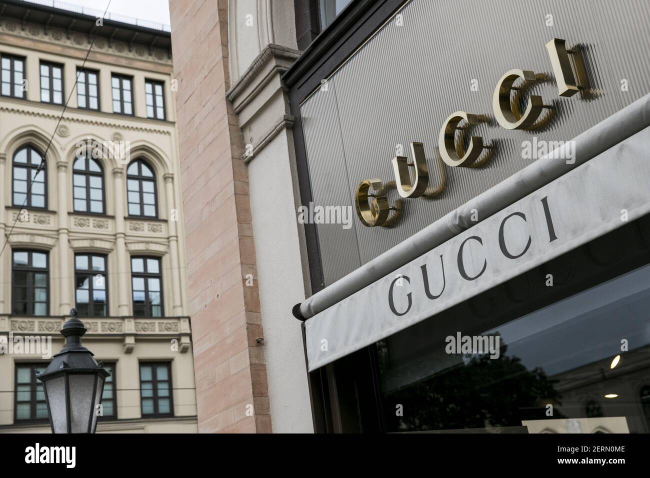 A logo sign outside of a Gucci retail store in Munich, Germany, on ...
