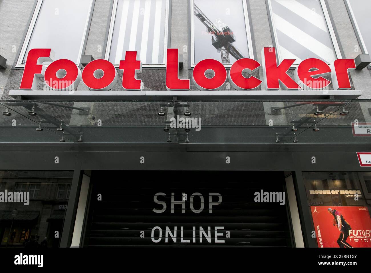A logo sign outside of a Foot Locker retail store in Munich, Germany ...