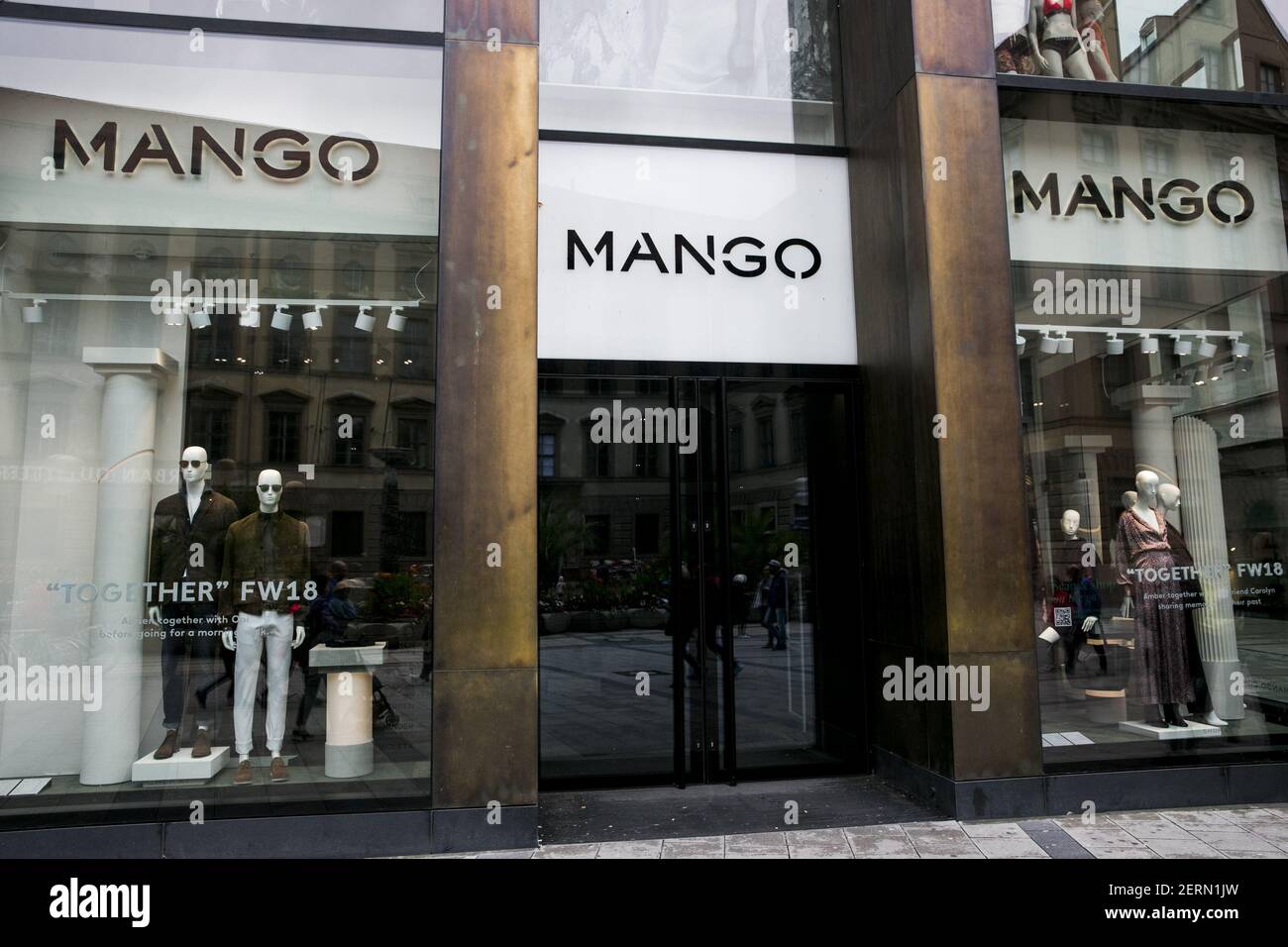 A logo sign outside of a MANGO retail store in Munich, Germany, on ...