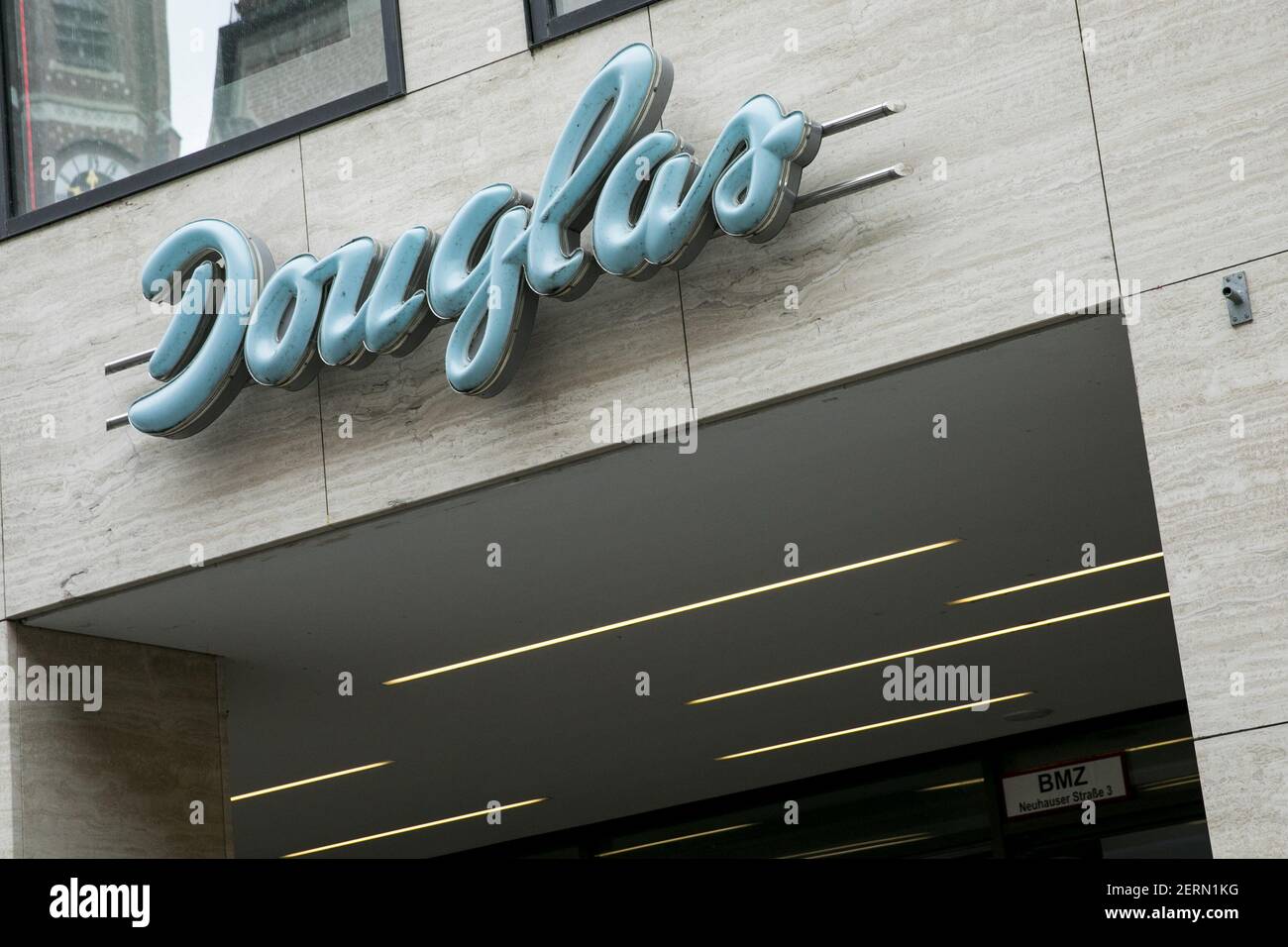 A logo sign outside of a Douglas cosmetics retail store in Munich ...
