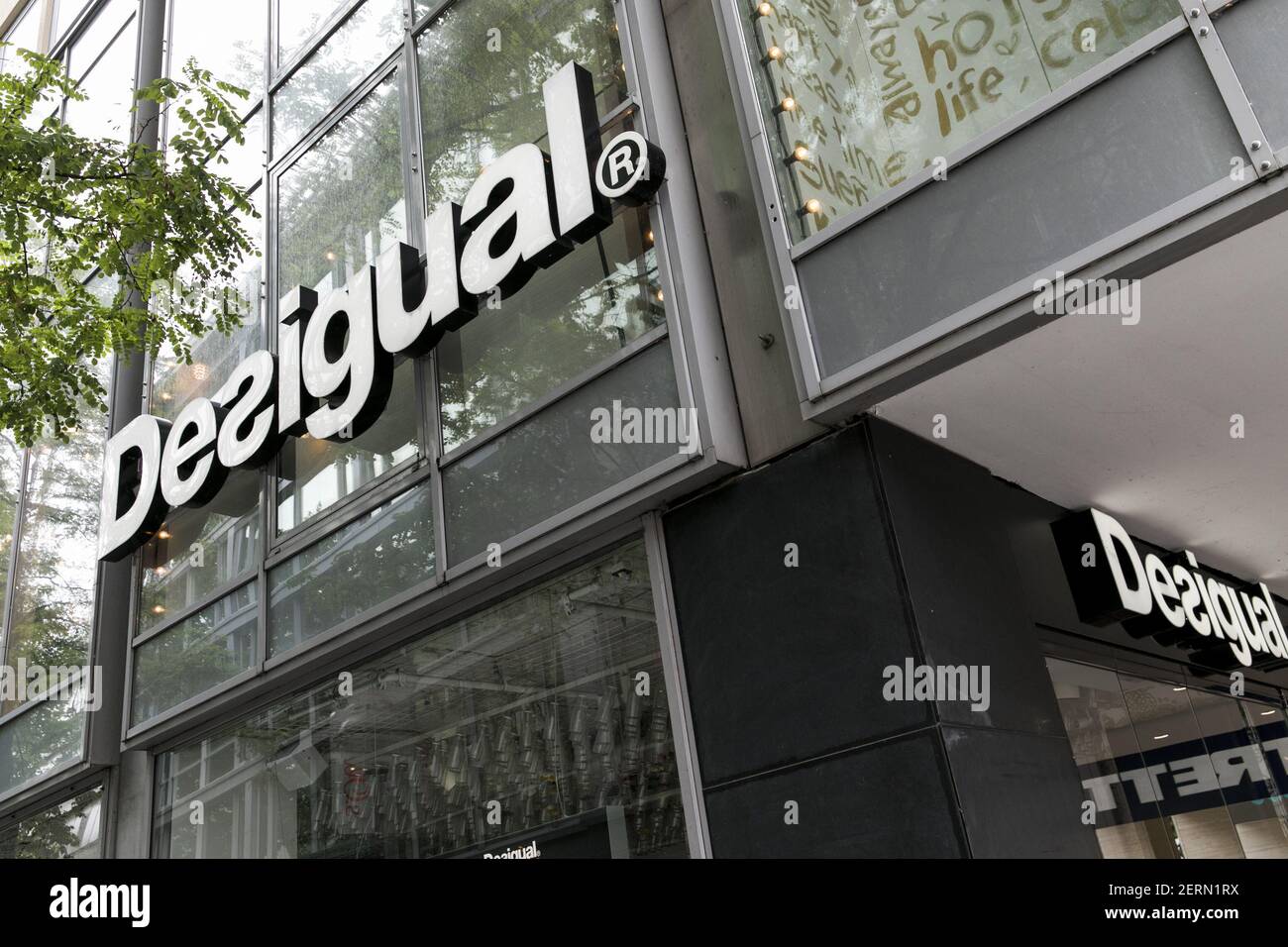 A logo sign outside of a Desigual retail store in Munich, Germany, on ...