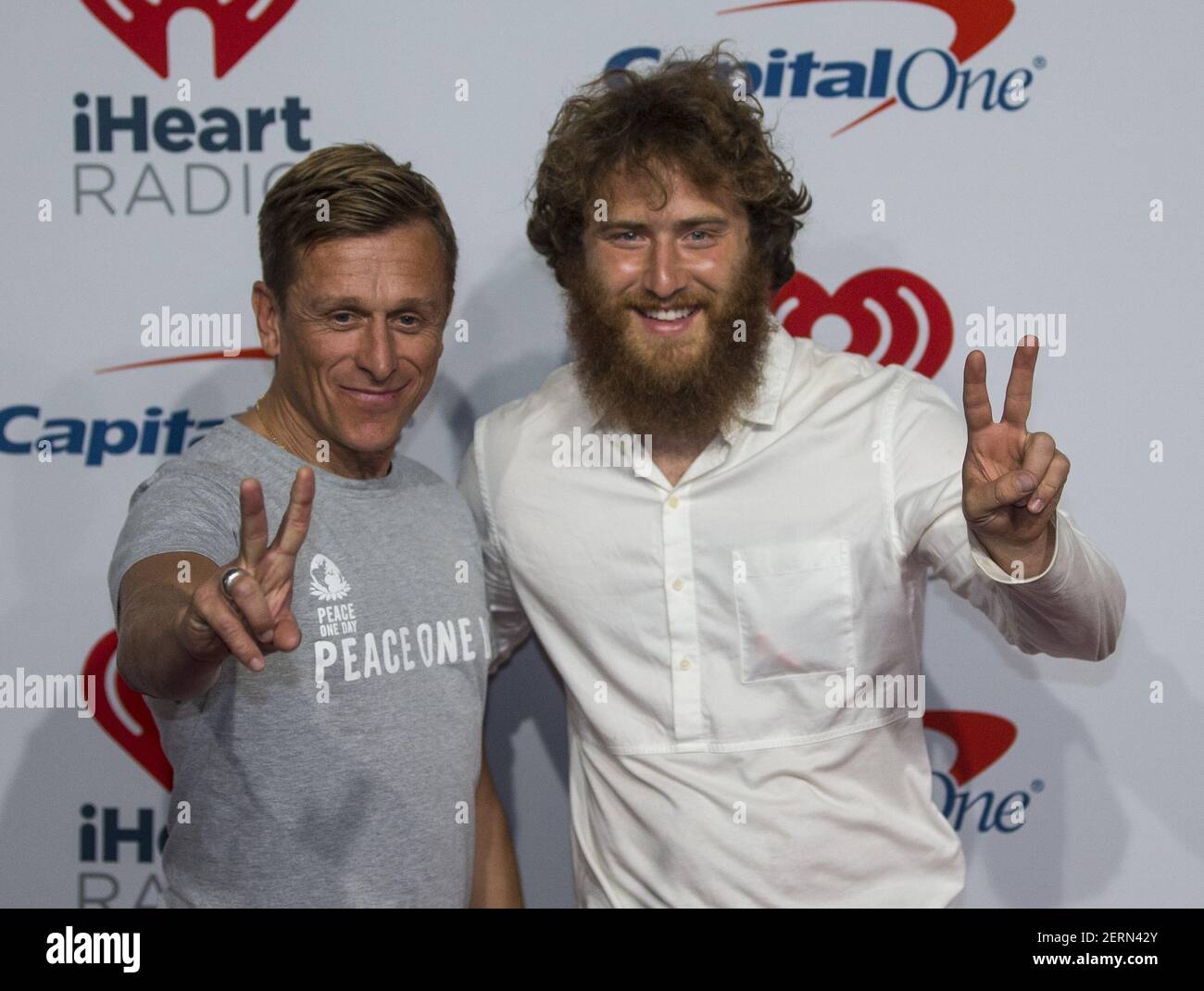 Jeremy Gilley with Peace One Day and musician Mike Posner walking on ...