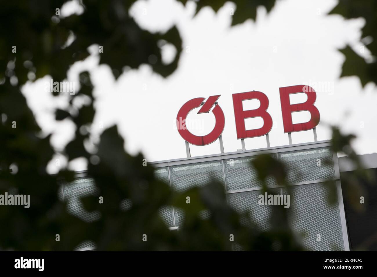 A logo sign outside of a OBB (Austrian Federal Railways) station in ...