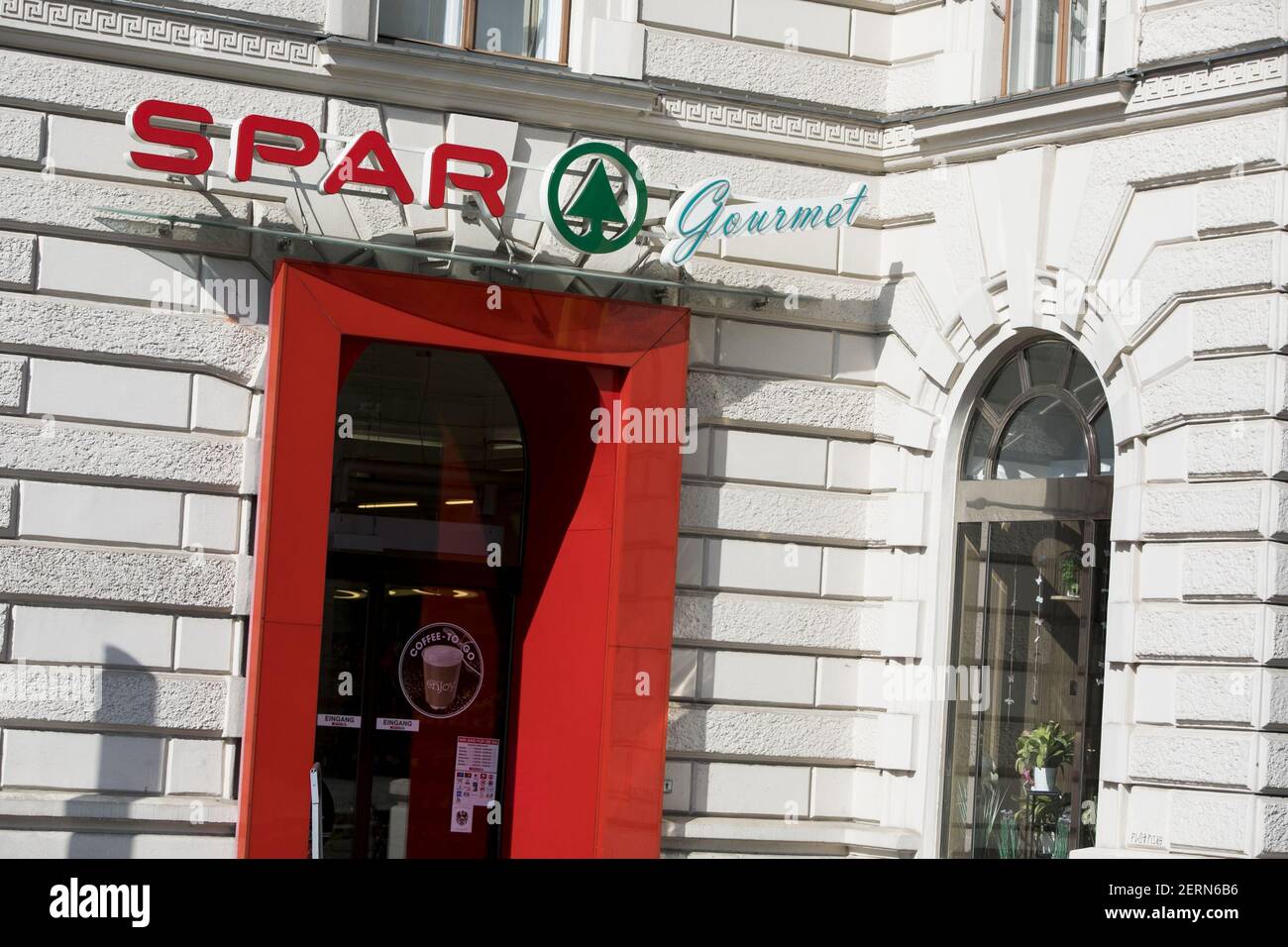 A logo sign outside of a SPAR retail grocery store in Vienna, Austria ...