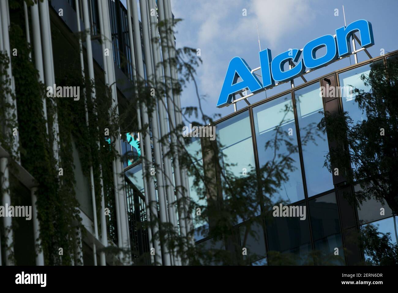 A logo sign outside of a facility occupied by Alcon in Vienna, Austria ...