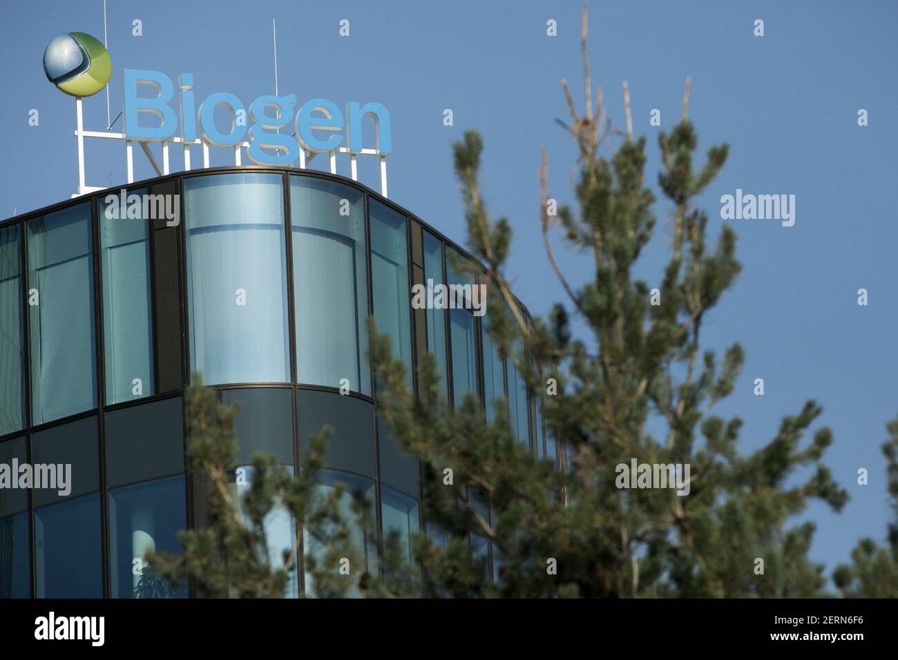 A logo sign outside of a facility occupied by Biogen in Vienna, Austria ...