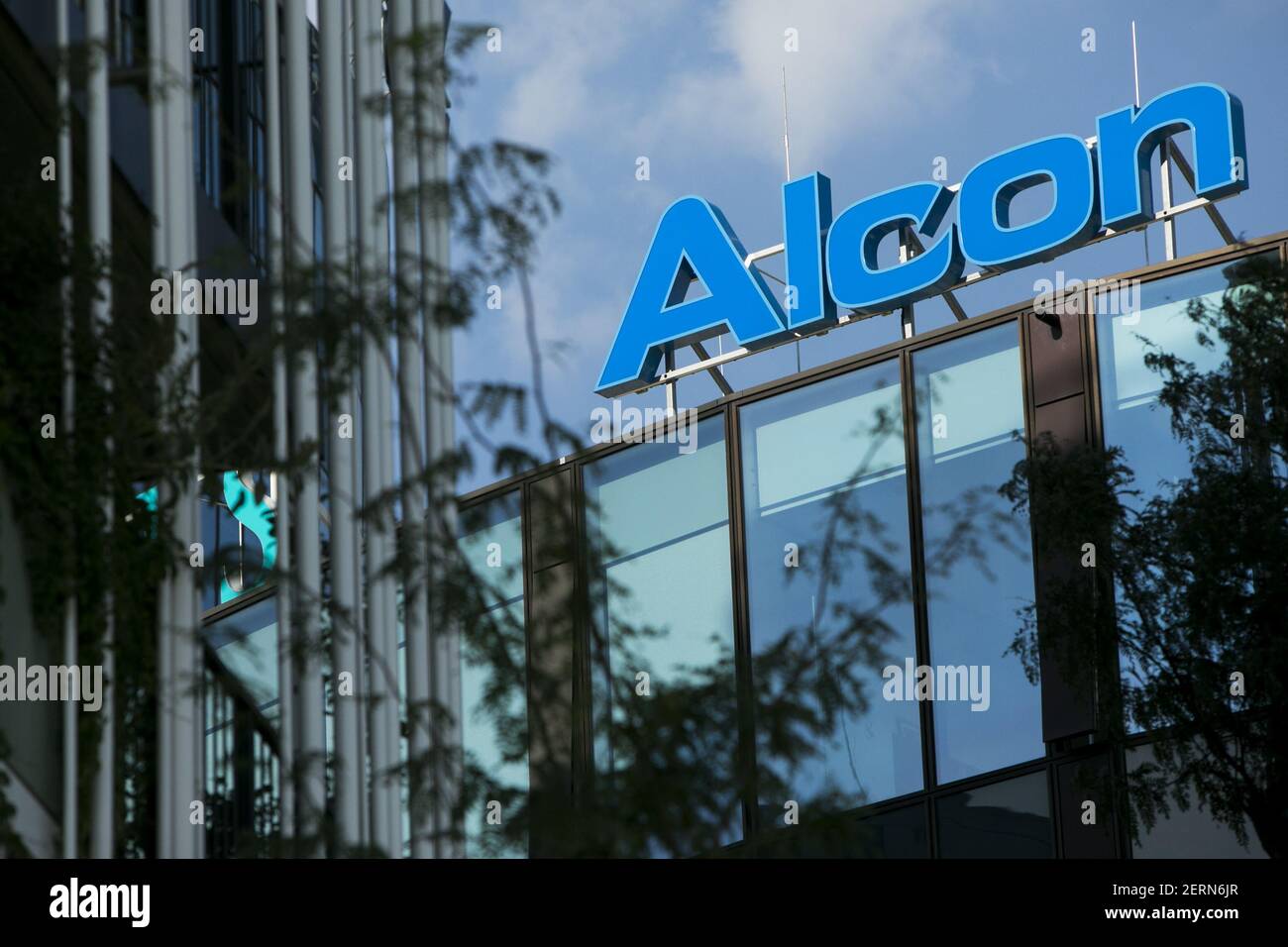 A logo sign outside of a facility occupied by Alcon in Vienna, Austria ...
