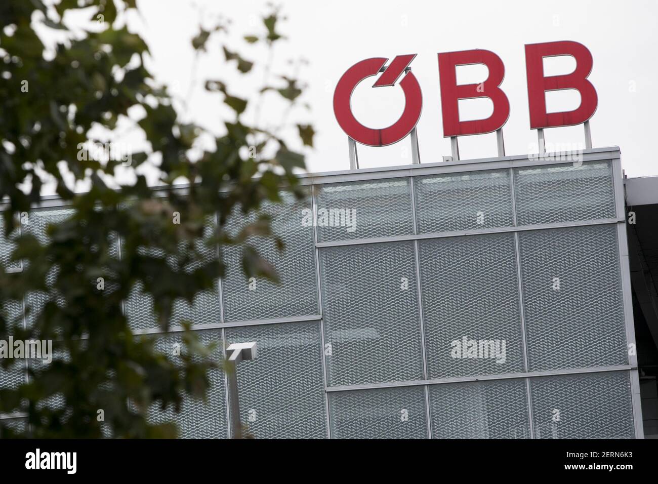 A logo sign outside of a OBB (Austrian Federal Railways) station in ...