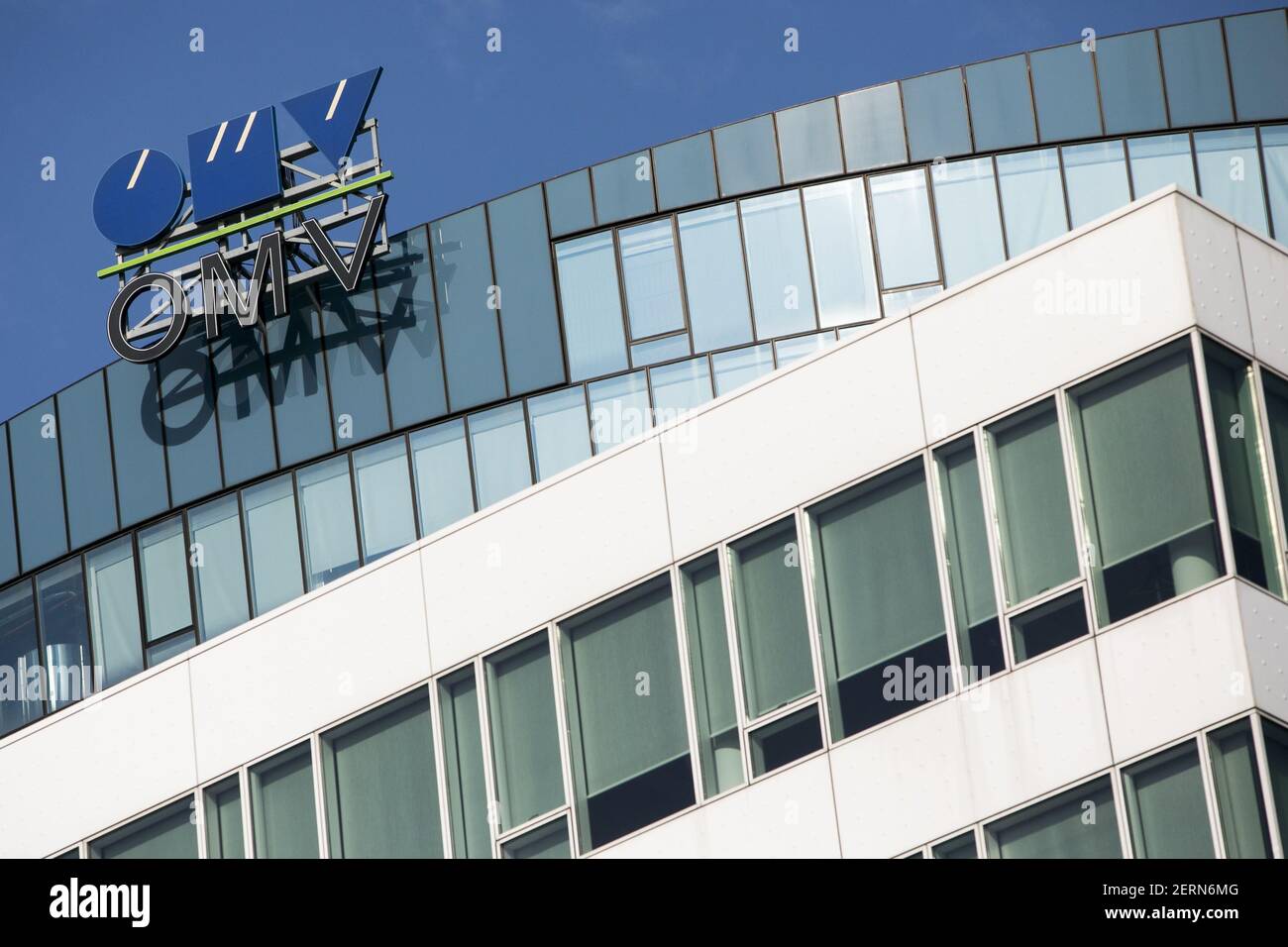 A logo sign outside of the headquarters of OMV AG in Vienna, Austria ...