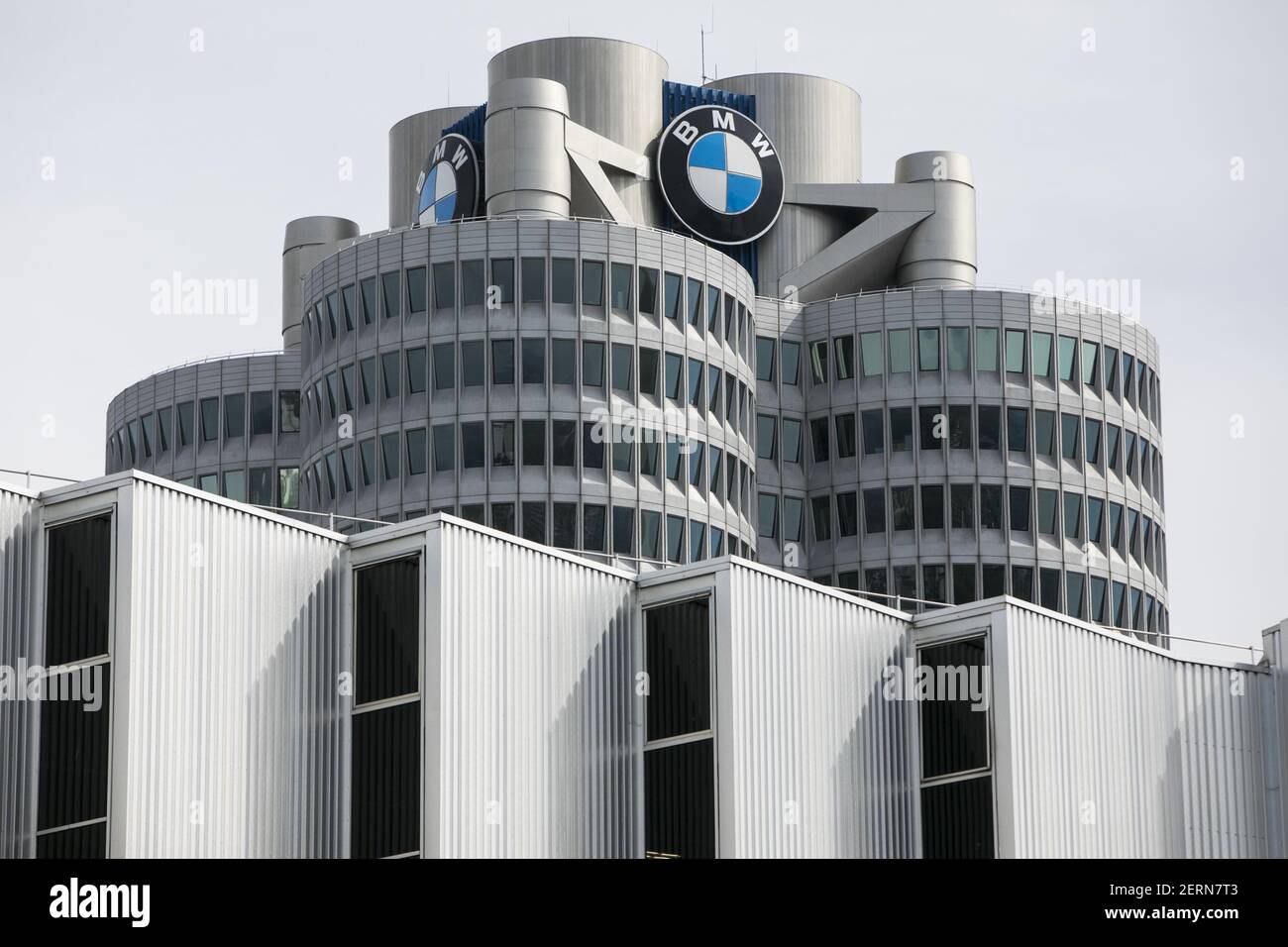 A logo sign outside of the headquarters of the BMW Group (Bayerische ...