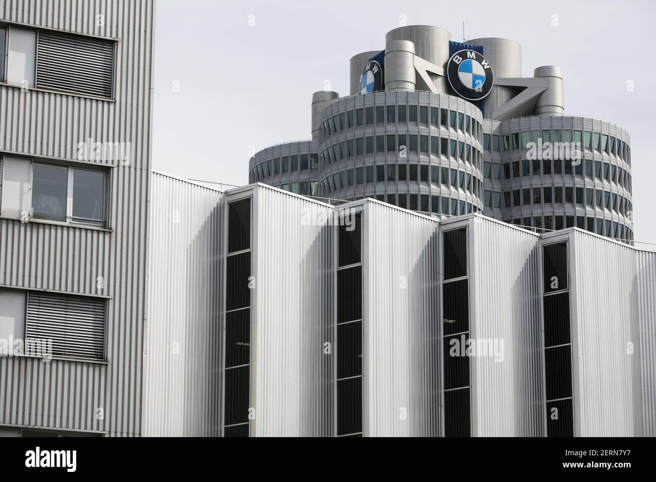A logo sign outside of the headquarters of the BMW Group (Bayerische ...