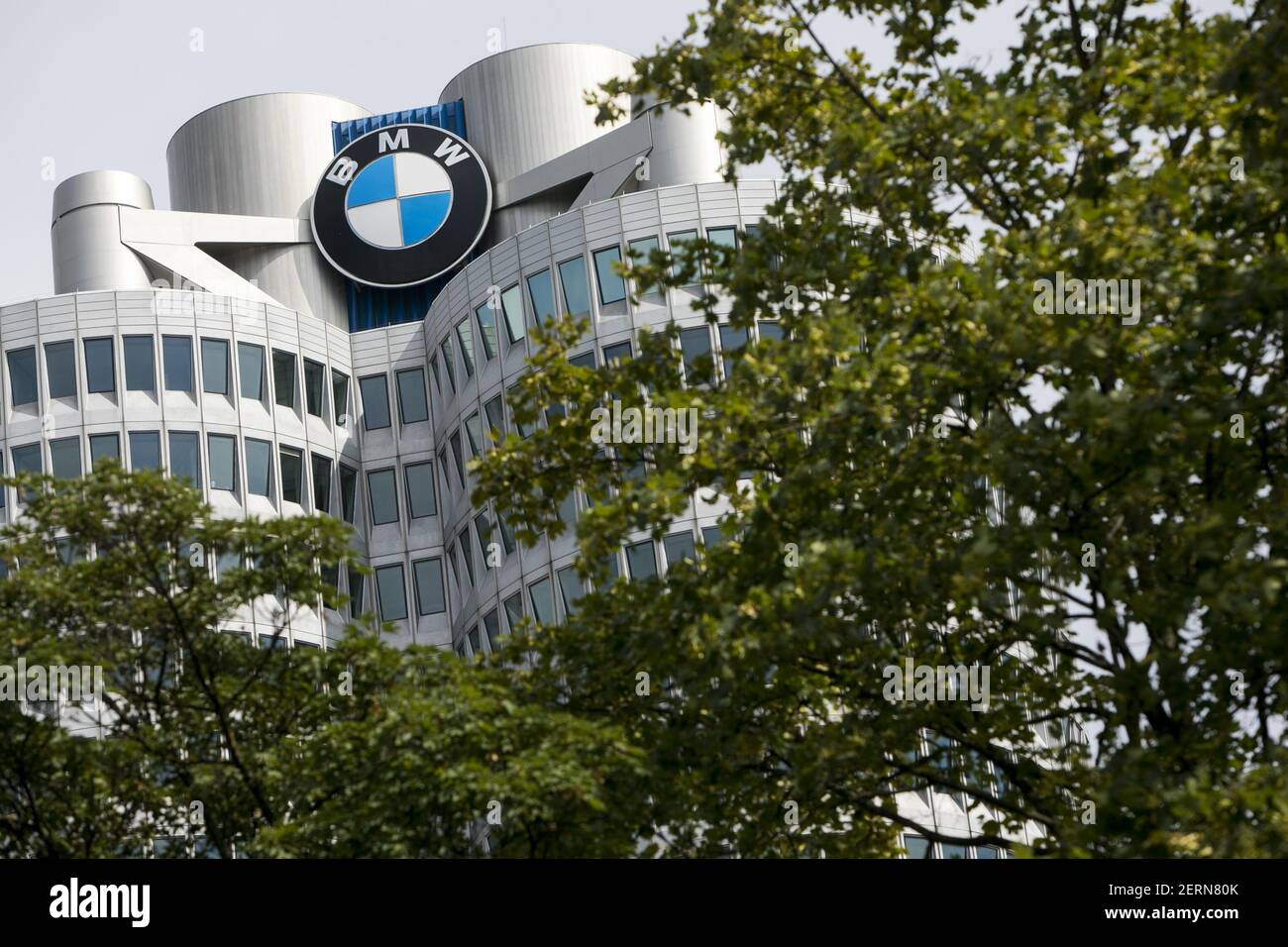 A logo sign outside of the headquarters of the BMW Group (Bayerische ...