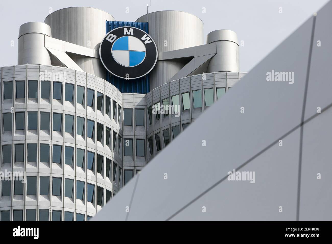 A logo sign outside of the headquarters of the BMW Group (Bayerische ...