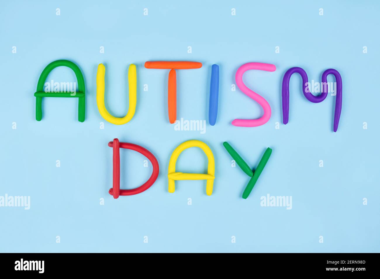 World Autism Awareness Day concept - multicolored letters made of play ...