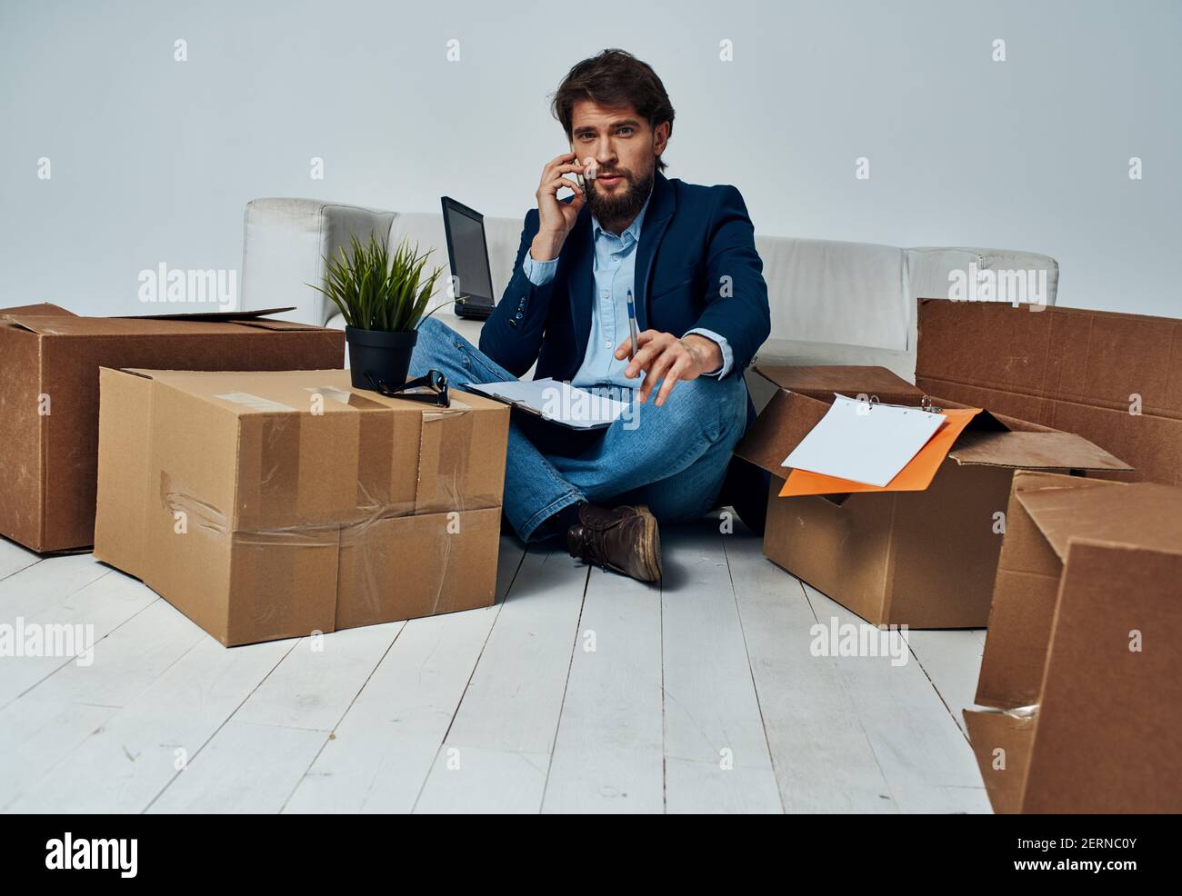 business man talking on the phone boxes with things work office Stock ...