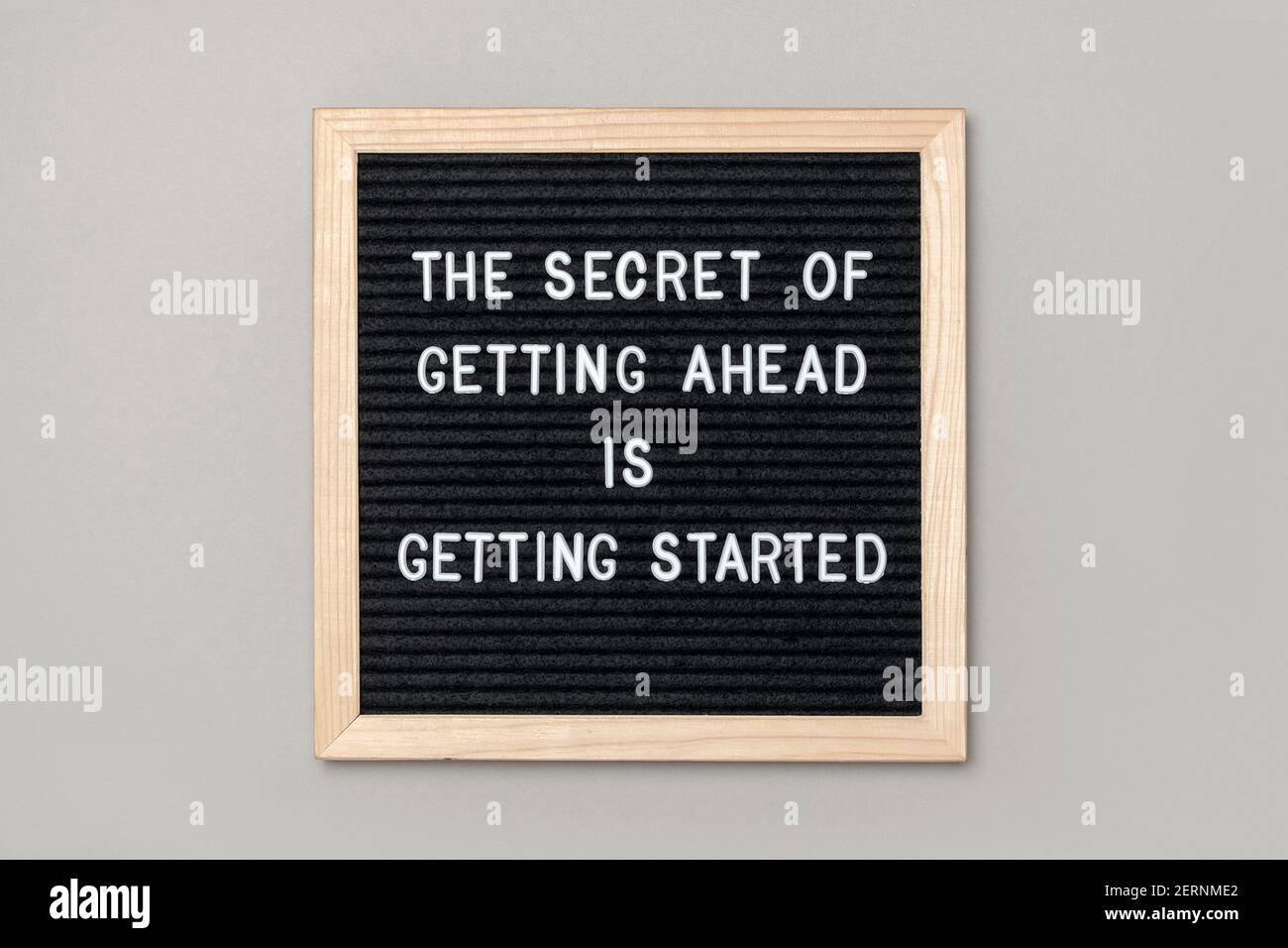 The secret of getting ahead is getting started. Motivational quote on ...
