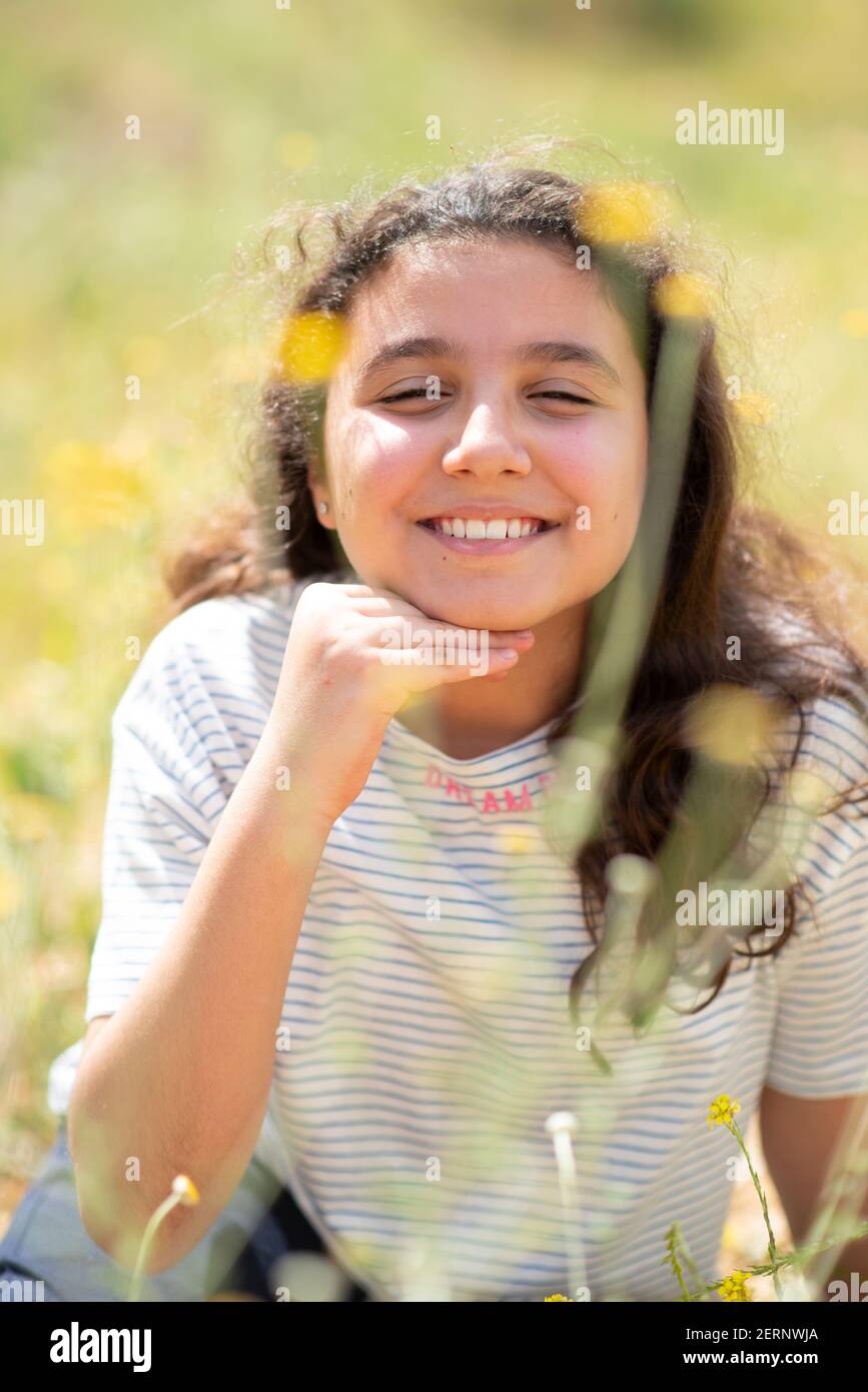 Beautiful 12 years old middle eastern girl in nature Stock Photo - Alamy