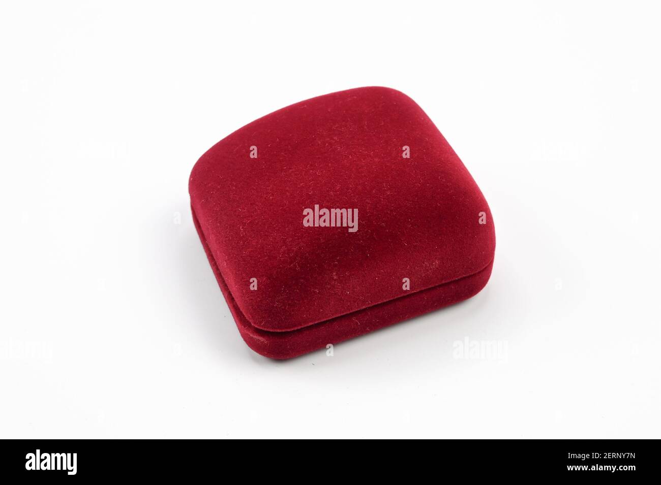 Dark burgundy jewelry box, on an isolated white background . High ...
