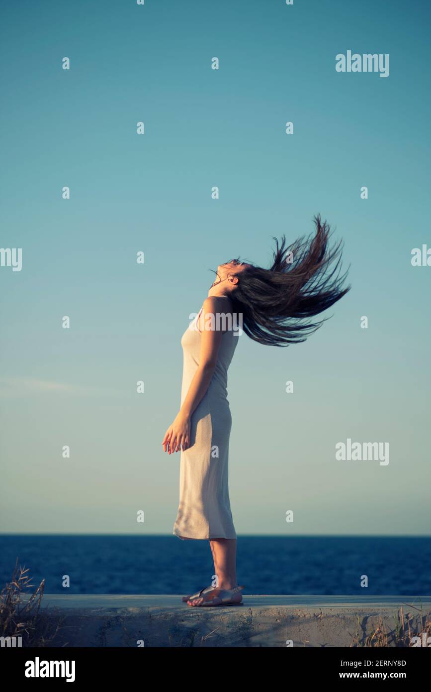 Flicking hair back hi-res stock photography and images - Alamy