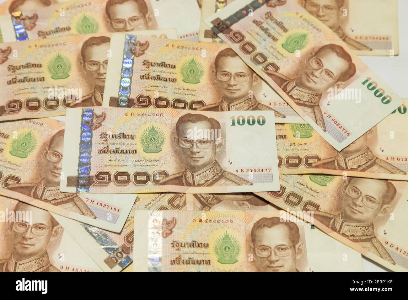 stack of Thai money banknotes baht on white background Stock Photo - Alamy