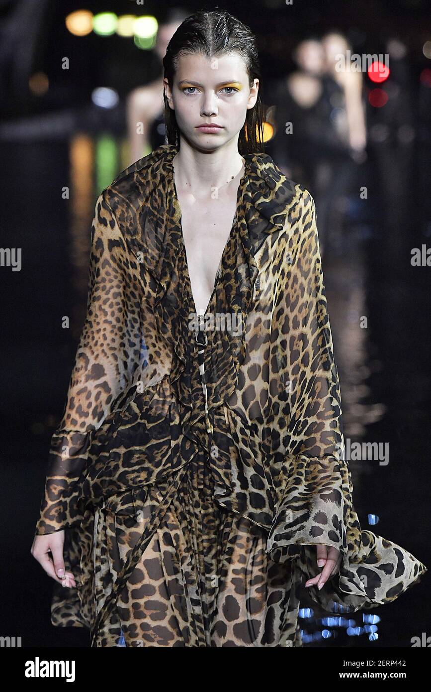 Model Mathilde Henning walks on the runway during the YSL Fashion Show ...
