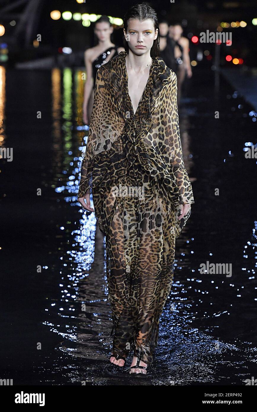Model Mathilde Henning walks on the runway during the YSL Fashion Show ...