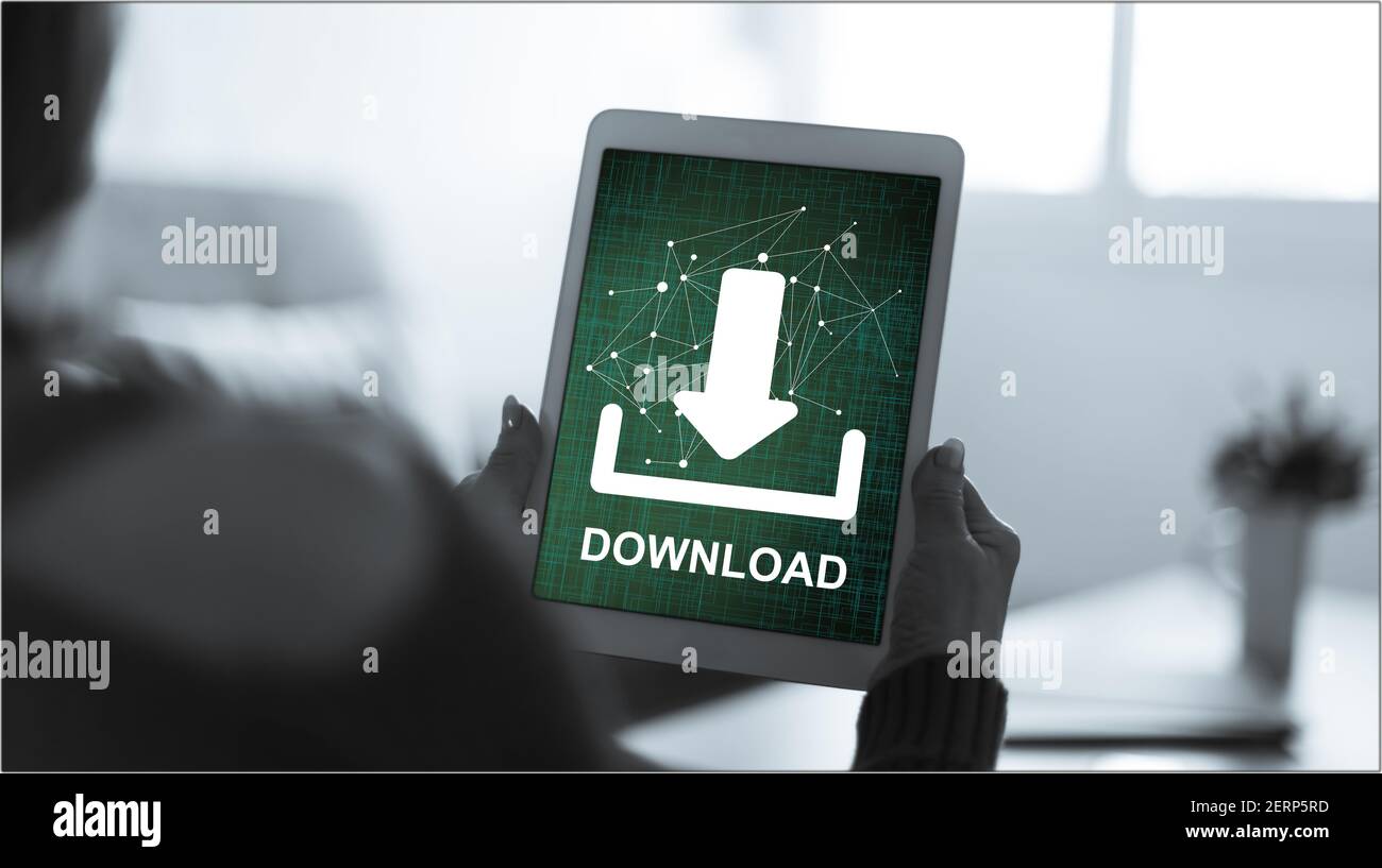 Tablet screen displaying a download concept Stock Photo - Alamy