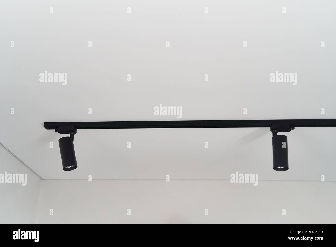 Modern LED black track lights in the interior Stock Photo - Alamy