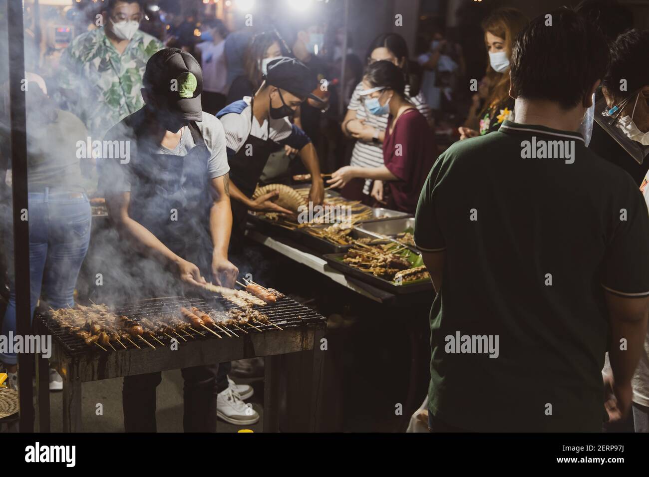 Feb 14, 2021 Man grilling barbecue at the Sunday market at Makati city ...