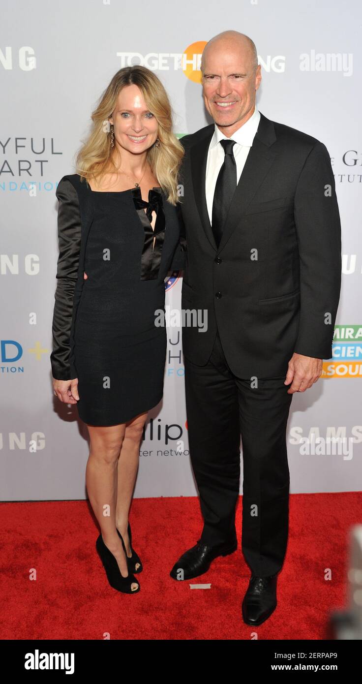 L-R: Kim Clark and NHL Hall of Fame player Mark Messier attend the 17th ...
