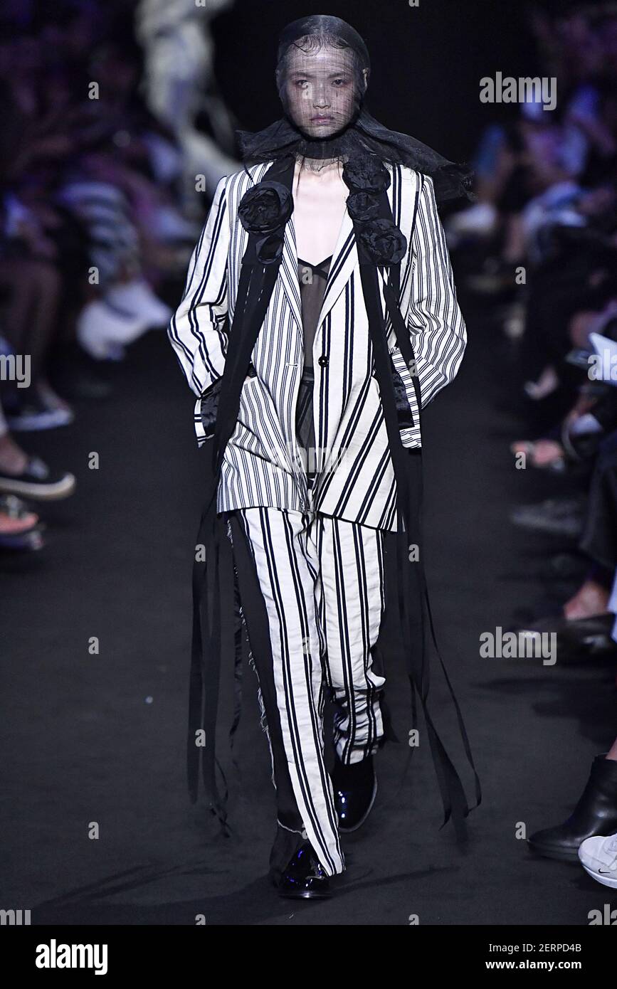 Model Xie Chaoyu walks on the runway during the Ann Demeulemeester ...