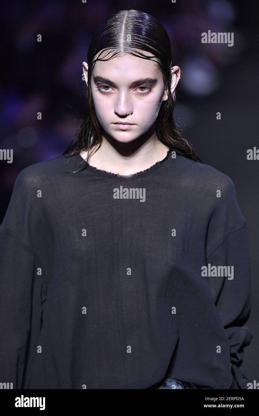 Model Ratner walks on the runway during the Ann Demeulemeester Fashion ...